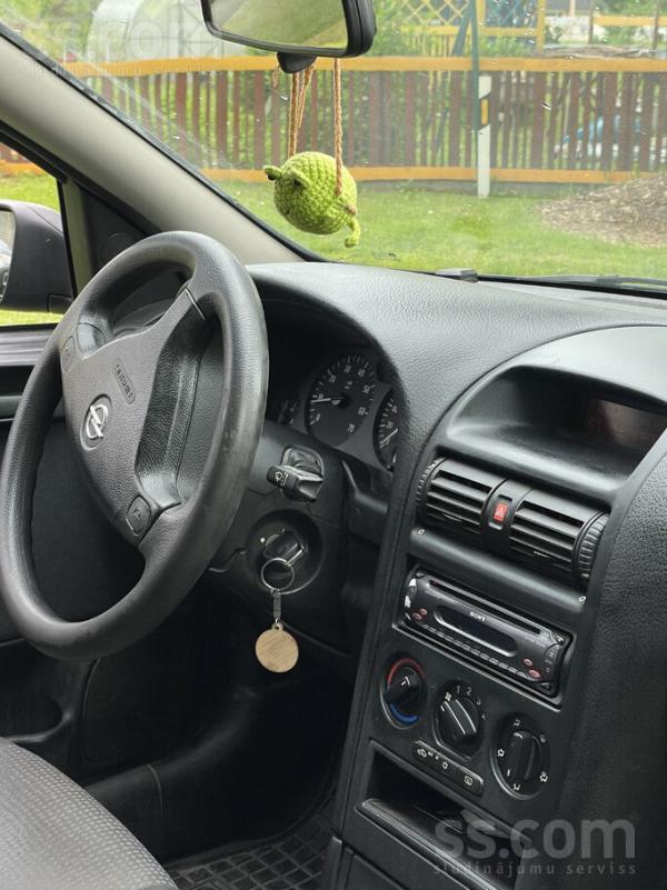 Blue Opel Astra 2005 in Jelgava, with an engine capacity of 1.40 L and mileage of 166 thousand km for 1200 €, photo 9 on AUTOMOTO.COM.LV