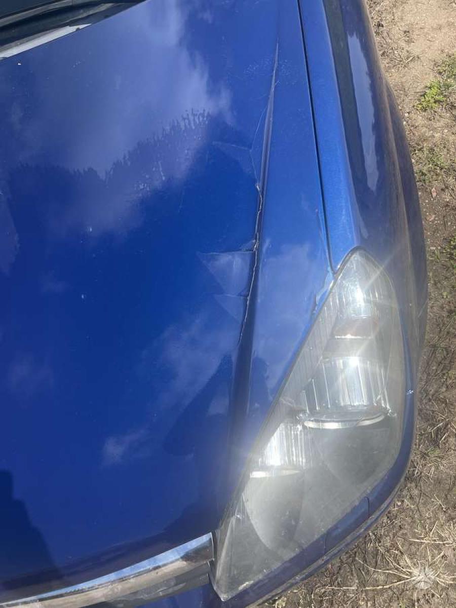 Zils Opel Astra 2005 Telšiai, ar dzinēja tilpumu 1.69 L un nobraukumu 268 tūkst. km par 1000 €, foto 4 vietnē AUTOMOTO.COM.LV