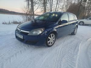 Zils Opel Astra 2006 Kauņa, ar dzinēja tilpumu 1.90 L un nobraukumu 241 tūkst. km par 1050 €, foto  vietnē AUTOMOTO.COM.LV