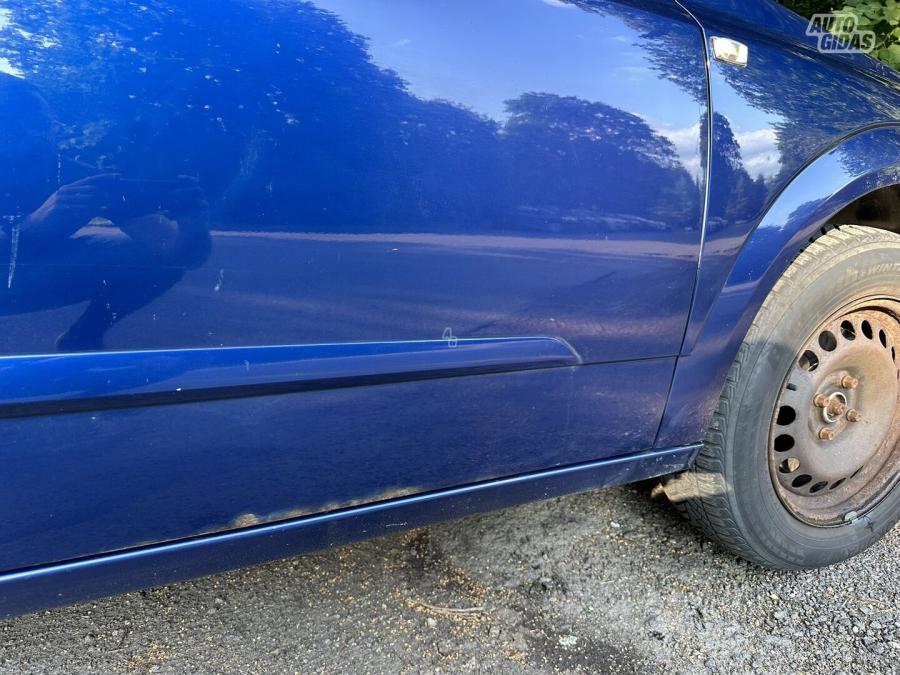 Zils Opel Astra 2006 Viļņa, ar dzinēja tilpumu 1.60 L un nobraukumu 210 tūkst. km par 900 €, foto 14 vietnē AUTOMOTO.COM.LV