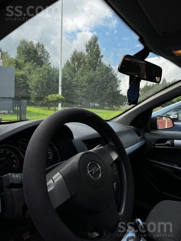 Zils Opel Astra 2007 Valmiera, ar dzinēja tilpumu 1.60 L un nobraukumu 186 tūkst. km par 1000 €, foto 7 vietnē AUTOMOTO.COM.LV
