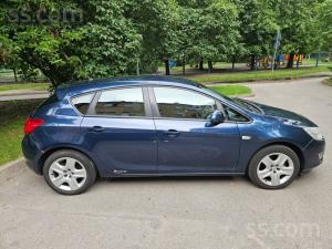 Blue Opel Astra 2010 in Riga, with an engine capacity of 1.40 L and mileage of 214 thousand km for 2500 €, photo 13 on AUTOMOTO.COM.LV