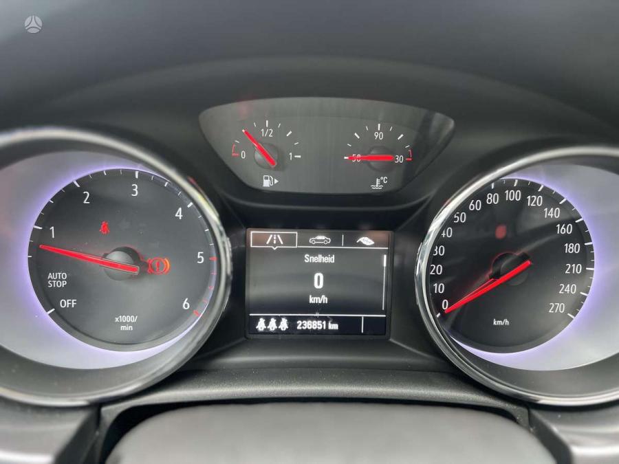 Blue Opel Astra 2016 in Kazlu Ruda, with an engine capacity of 1.60 L and mileage of 237 thousand km for 5500 €, photo 16 on AUTOMOTO.COM.LV