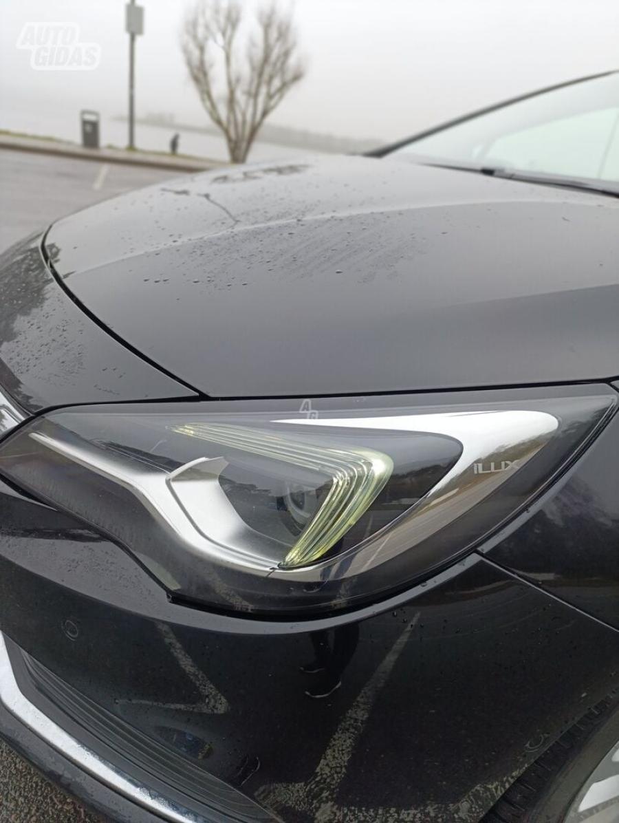 Blue Opel Astra 2017 in Kaunas, with an engine capacity of 1.60 L and mileage of 298 thousand km for 6800 €, photo 6 on AUTOMOTO.COM.LV