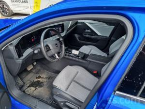 Blue Opel Astra 2022 in Riga, with an engine capacity of 1.20 L and mileage of 99 thousand km for 15500 €, photo 7 on AUTOMOTO.COM.LV