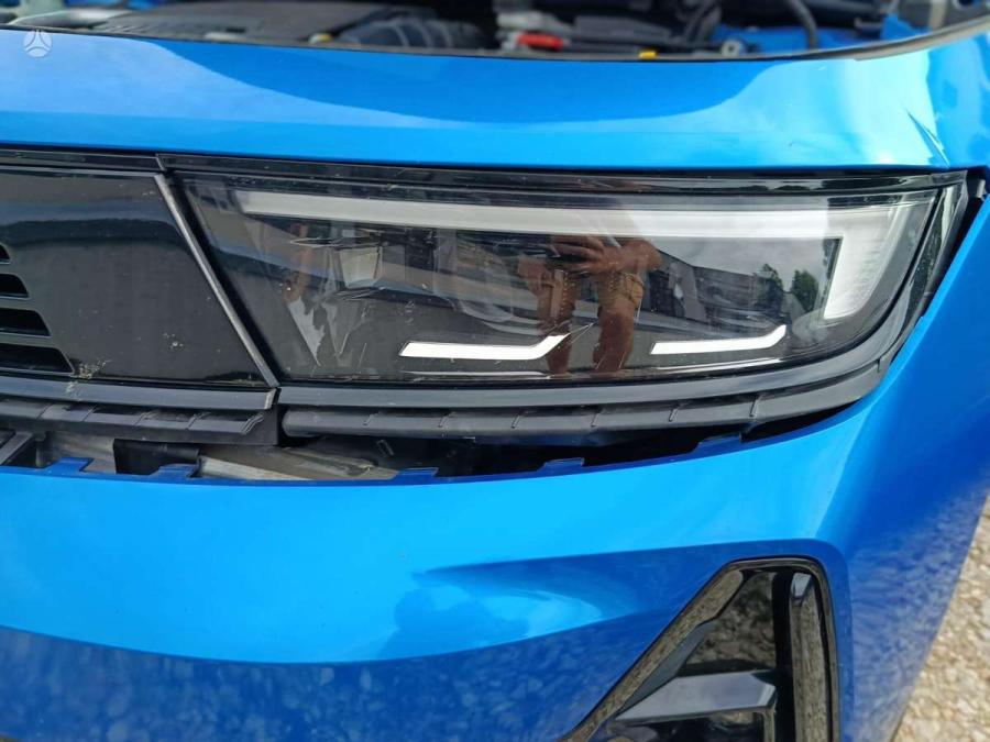Blue Opel Astra 2024 in Vilnius, with an engine capacity of 1.20 L and mileage of 30 thousand km for 13000 €, photo 12 on AUTOMOTO.COM.LV