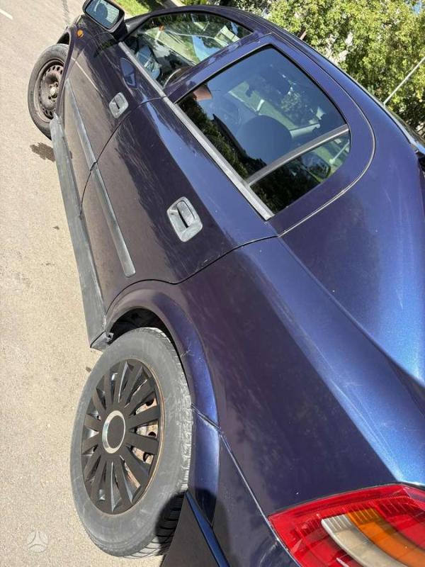Blue Opel Astra 1999 in Marijampole, with an engine capacity of 2.00 L and mileage of 251 thousand km for 400 €, photo 3 on AUTOMOTO.COM.LV