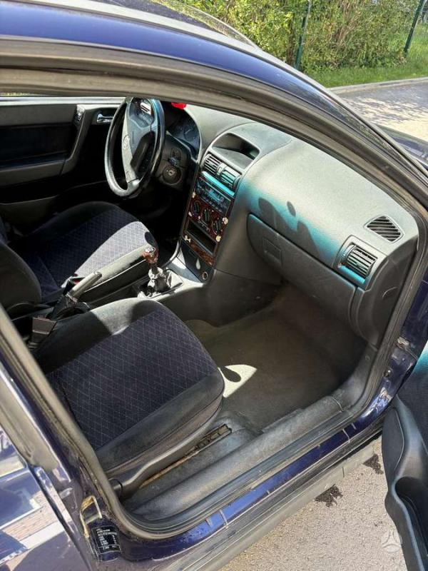 Blue Opel Astra 1999 in Marijampole, with an engine capacity of 2.00 L and mileage of 251 thousand km for 400 €, photo 6 on AUTOMOTO.COM.LV