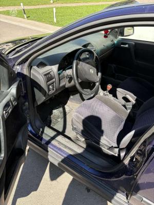 Blue Opel Astra 1999 in Marijampole, with an engine capacity of 2.00 L and mileage of 251 thousand km for 400 €, photo 10 on AUTOMOTO.COM.LV