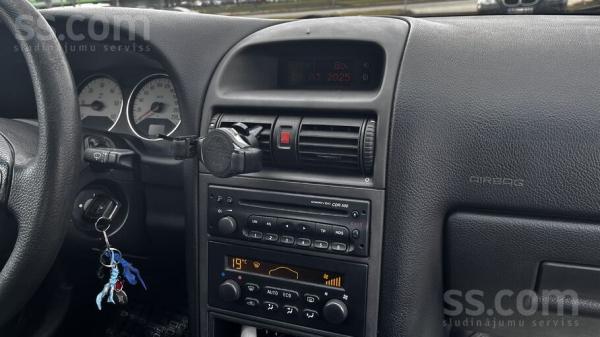 Zils Opel Astra 2003 Rīga, ar dzinēja tilpumu 2.00 L un nobraukumu 154 tūkst. km par 1500 €, foto 6 vietnē AUTOMOTO.COM.LV