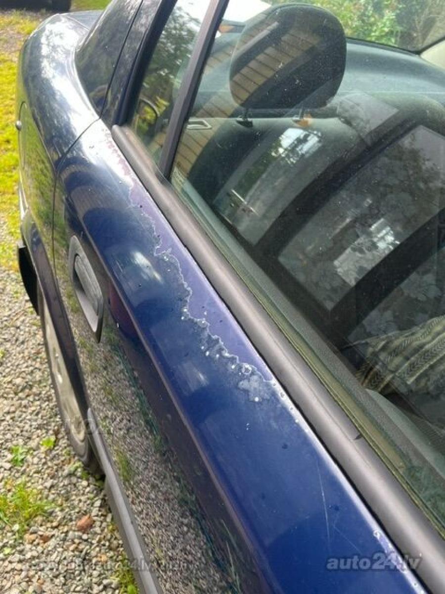 Zils Opel Astra 2005 Tallina, ar dzinēja tilpumu 1.40 L un nobraukumu 178 tūkst. km par 1100 €, foto 10 vietnē AUTOMOTO.COM.LV