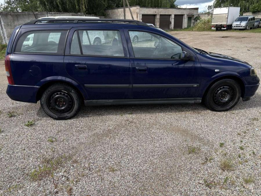 Blue Opel Astra 2004 in Joniskis, with an engine capacity of 2.00 L and mileage of 340 thousand km for 570 €, photo 12 on AUTOMOTO.COM.LV