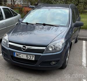 Zils Opel Astra 2006 Rīga, ar dzinēja tilpumu 1.90 L un nobraukumu 234 tūkst. km par 1600 €, foto  vietnē AUTOMOTO.COM.LV