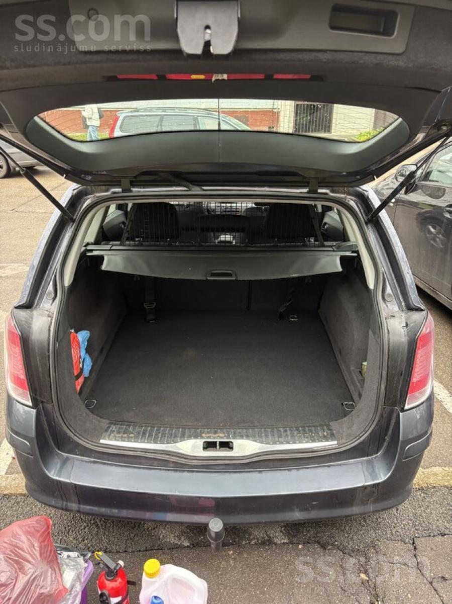 Zils Opel Astra 2006 Rīga, ar dzinēja tilpumu 1.90 L un nobraukumu 234 tūkst. km par 1600 €, foto 6 vietnē AUTOMOTO.COM.LV