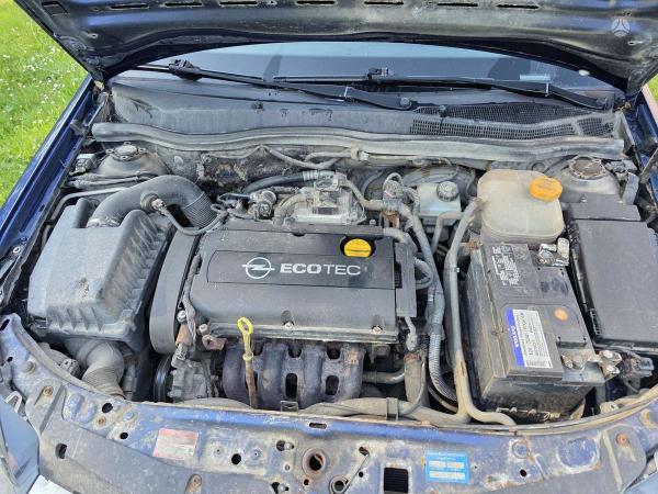 Blue Opel Astra 2008 in Utena, with an engine capacity of 1.60 L and mileage of 361 thousand km for 1200 €, photo 9 on AUTOMOTO.COM.LV
