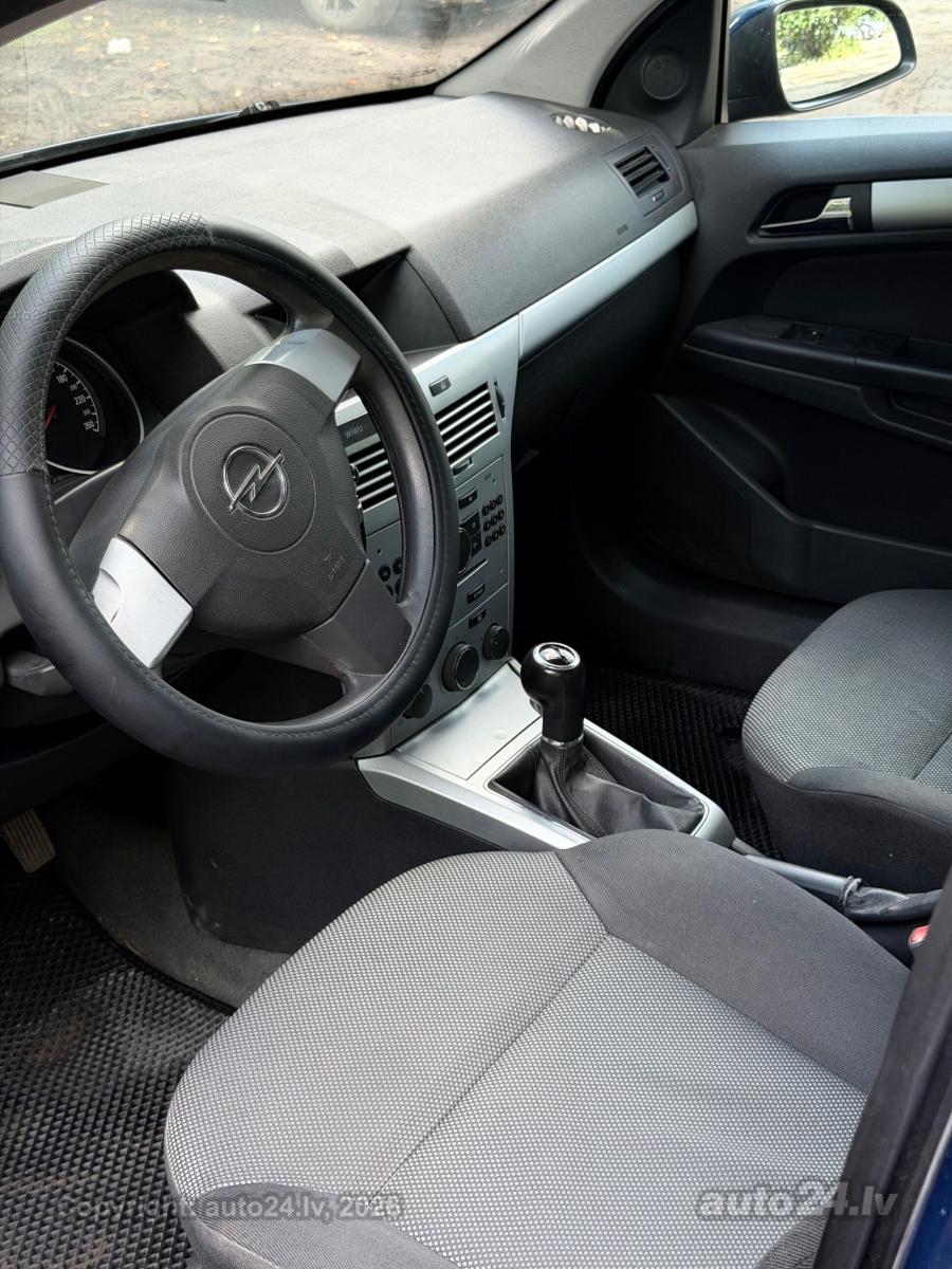 Blue Opel Astra 2009 in Tartu, with an engine capacity of 1.60 L and mileage of 342 thousand km for 1499 €, photo 10 on AUTOMOTO.COM.LV
