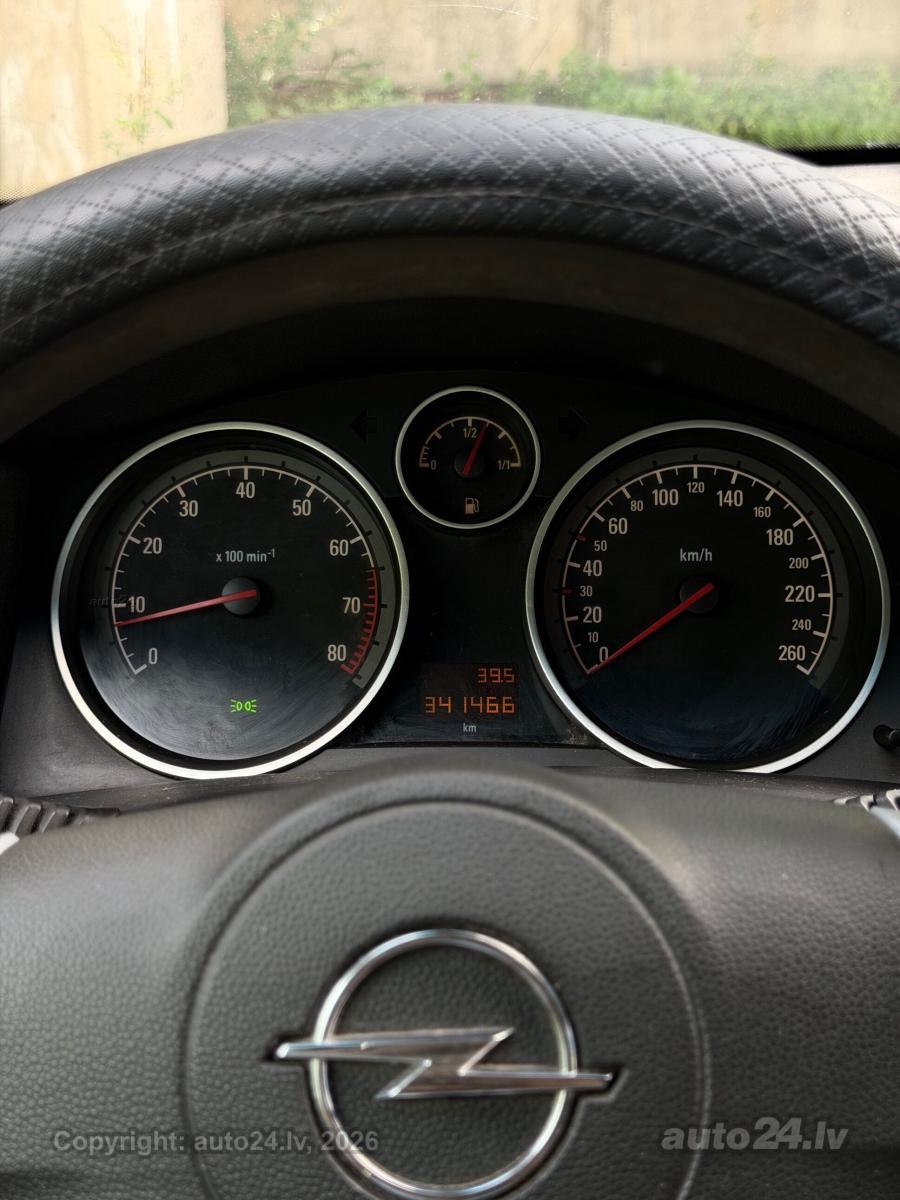Blue Opel Astra 2009 in Tartu, with an engine capacity of 1.60 L and mileage of 342 thousand km for 1499 €, photo 12 on AUTOMOTO.COM.LV