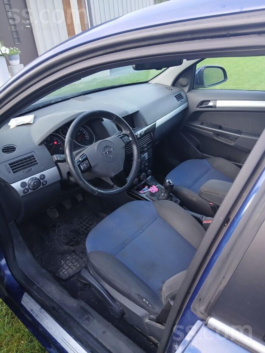 Zils Opel Astra 2010 Ogre, ar dzinēja tilpumu 1.90 L un nobraukumu 362 tūkst. km par 800 €, foto 8 vietnē AUTOMOTO.COM.LV