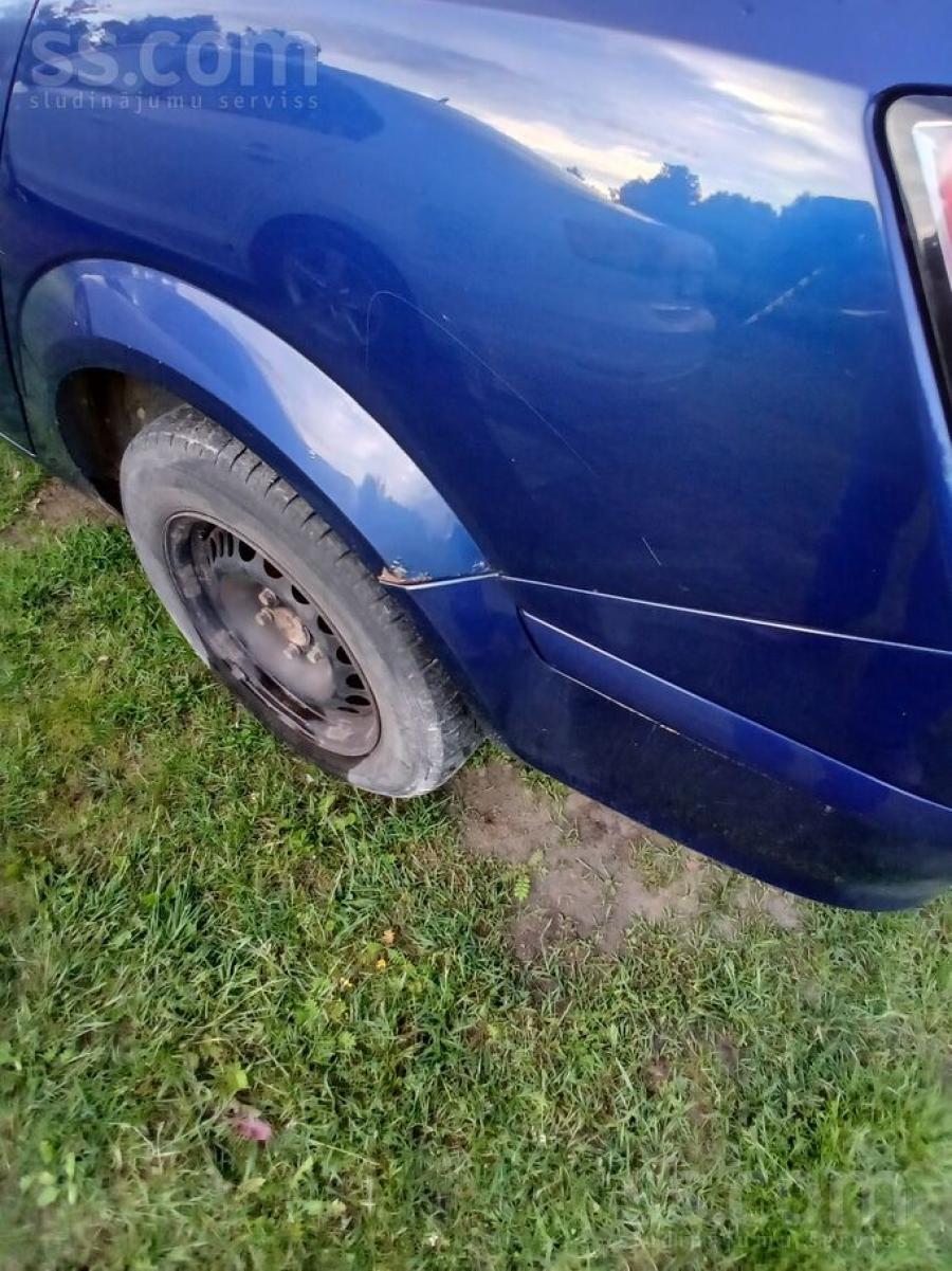 Zils Opel Astra 2010 Ogre, ar dzinēja tilpumu 1.90 L un nobraukumu 362 tūkst. km par 800 €, foto 11 vietnē AUTOMOTO.COM.LV