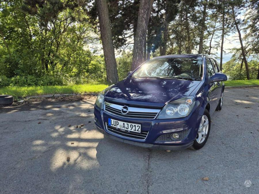Zils Opel Astra 2010 Viļņa, ar dzinēja tilpumu 1.69 L un nobraukumu 210 tūkst. km par 1999 €, foto 10 vietnē AUTOMOTO.COM.LV