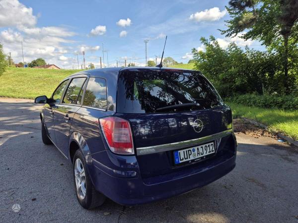 Zils Opel Astra 2010 Viļņa, ar dzinēja tilpumu 1.69 L un nobraukumu 210 tūkst. km par 1999 €, foto 10 vietnē AUTOMOTO.COM.LV
