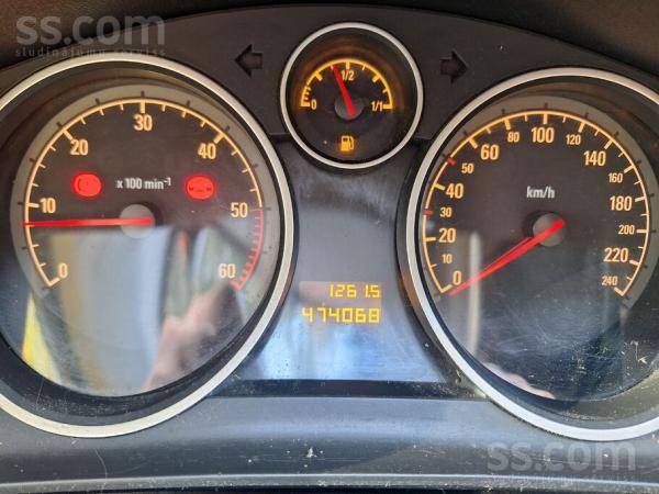 Blue Opel Astra 2010 in Tukums, with an engine capacity of 1.90 L and mileage of 474 thousand km for 1600 €, photo 8 on AUTOMOTO.COM.LV
