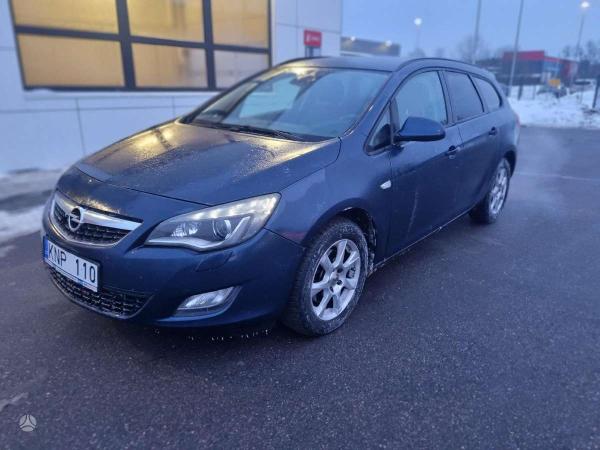 Blue Opel Astra 2011 in Kaunas, with an engine capacity of 1.96 L and mileage of 360 thousand km for 2150 €, photo 1 on AUTOMOTO.COM.LV