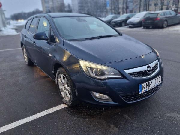 Blue Opel Astra 2011 in Kaunas, with an engine capacity of 1.96 L and mileage of 360 thousand km for 2150 €, photo 3 on AUTOMOTO.COM.LV