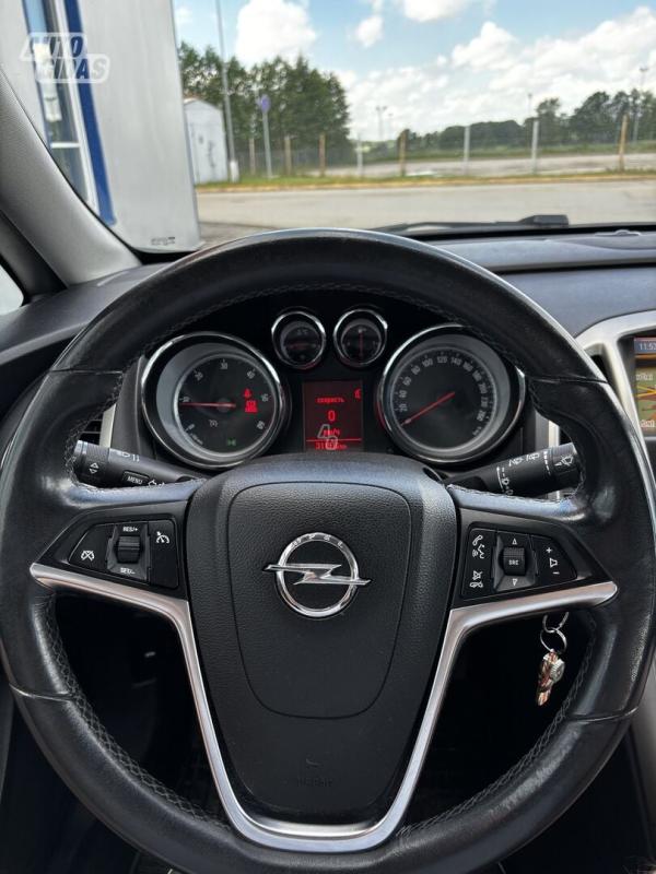 Blue Opel Astra 2011 in Marijampole, with an engine capacity of 1.70 L and mileage of 310 thousand km for 2300 €, photo 10 on AUTOMOTO.COM.LV