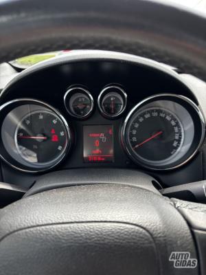 Zils Opel Astra 2011 Marijampole, ar dzinēja tilpumu 1.70 L un nobraukumu 310 tūkst. km par 2300 €, foto 13 vietnē AUTOMOTO.COM.LV