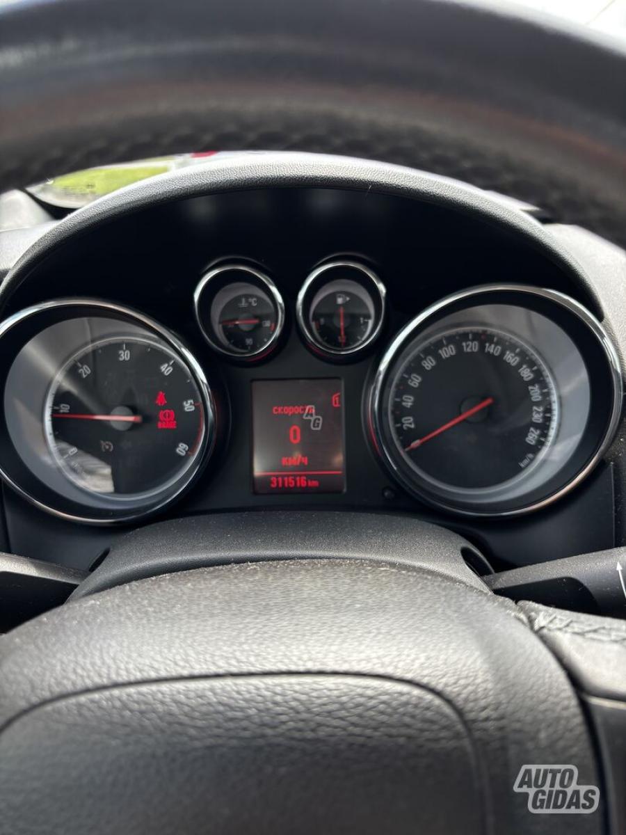 Zils Opel Astra 2011 Marijampole, ar dzinēja tilpumu 1.70 L un nobraukumu 310 tūkst. km par 2300 €, foto 13 vietnē AUTOMOTO.COM.LV