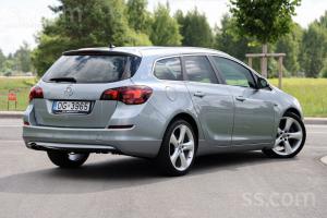 Blue Opel Astra 2011 in Jelgava, with an engine capacity of 2.00 L and mileage of 0 thousand km for 4350 €, photo 5 on AUTOMOTO.COM.LV
