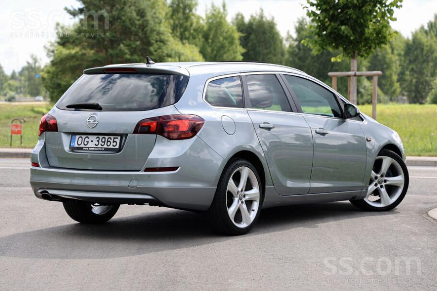 Blue Opel Astra 2011 in Jelgava, with an engine capacity of 2.00 L and mileage of 0 thousand km for 4350 €, photo 5 on AUTOMOTO.COM.LV