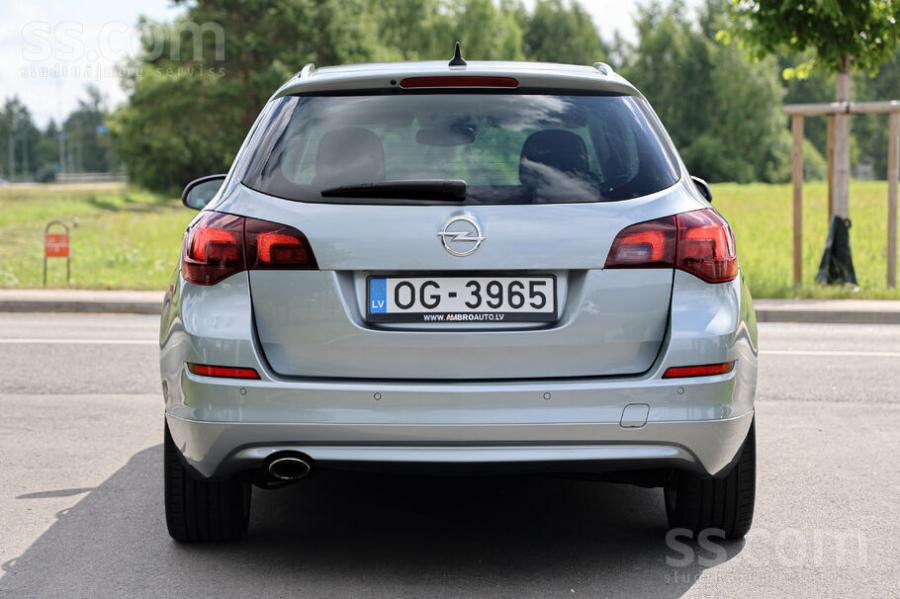 Blue Opel Astra 2011 in Jelgava, with an engine capacity of 2.00 L and mileage of 0 thousand km for 4350 €, photo 6 on AUTOMOTO.COM.LV