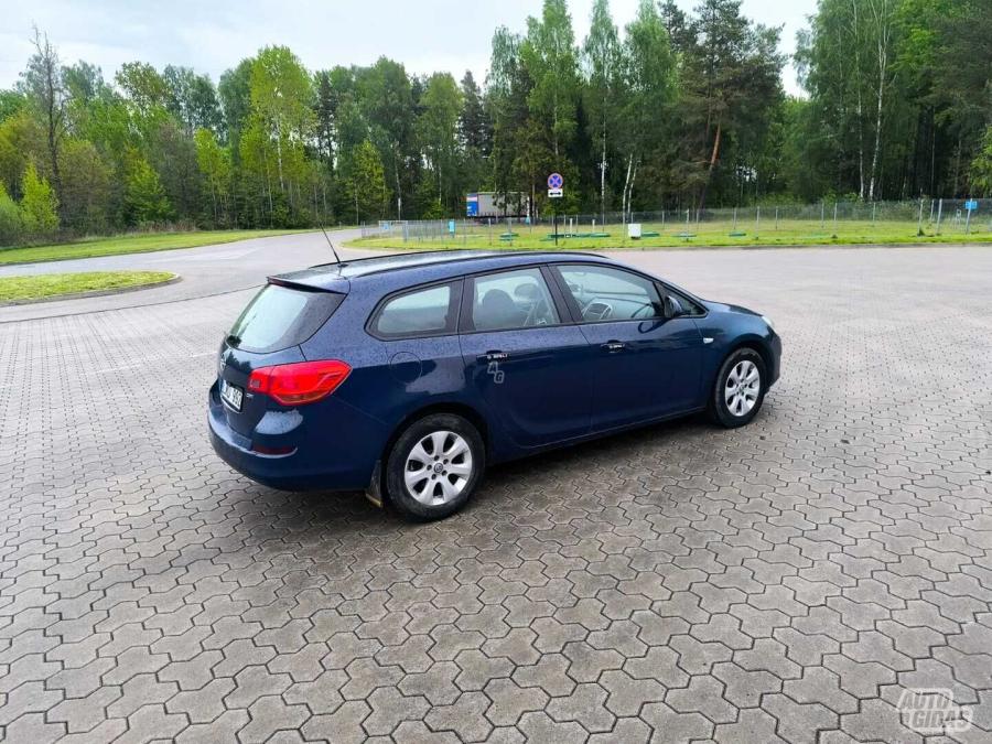 Blue Opel Astra 2011 in Kaunas, with an engine capacity of 1.70 L and mileage of 295 thousand km for 1590 €, photo 6 on AUTOMOTO.COM.LV