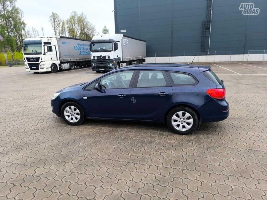 Blue Opel Astra 2011 in Kaunas, with an engine capacity of 1.70 L and mileage of 295 thousand km for 1590 €, photo 7 on AUTOMOTO.COM.LV