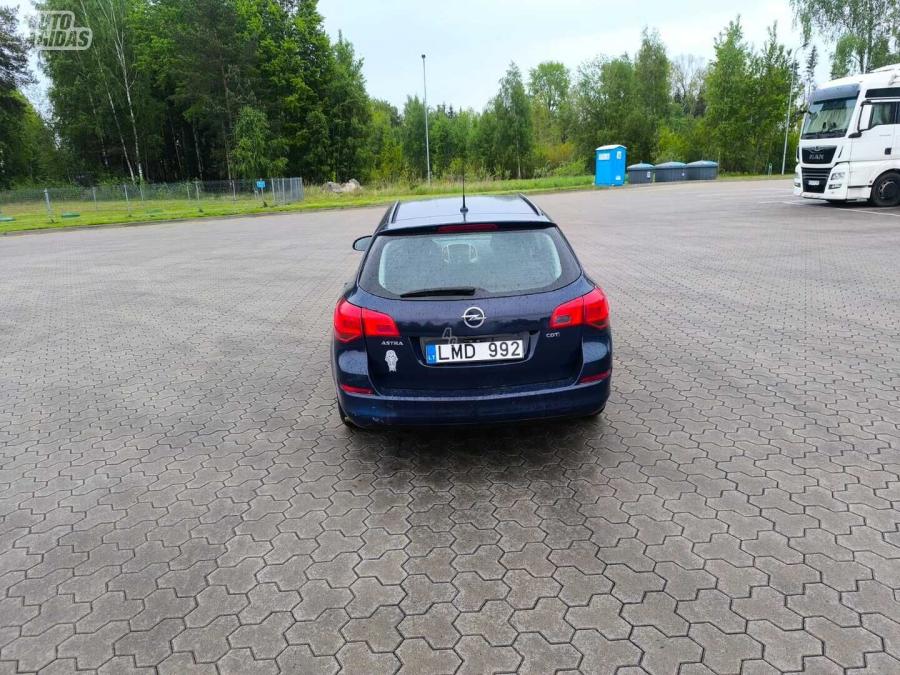 Blue Opel Astra 2011 in Kaunas, with an engine capacity of 1.70 L and mileage of 295 thousand km for 1590 €, photo 8 on AUTOMOTO.COM.LV