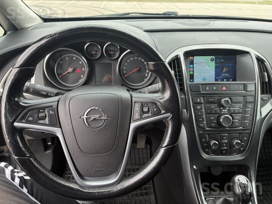 Zils Opel Astra 2011 Rīga, ar dzinēja tilpumu 1.30 L un nobraukumu 320 tūkst. km par 2500 €, foto 8 vietnē AUTOMOTO.COM.LV