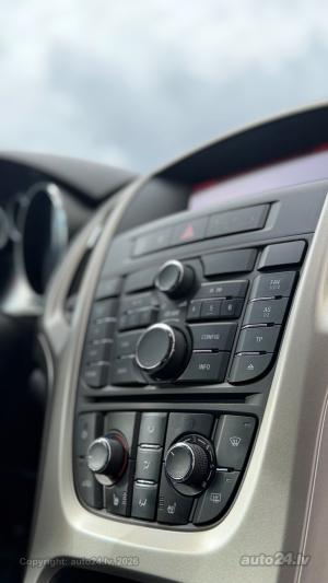 Zils Opel Astra 2011 Tallina, ar dzinēja tilpumu 1.40 L un nobraukumu 220 tūkst. km par 2699 €, foto 14 vietnē AUTOMOTO.COM.LV