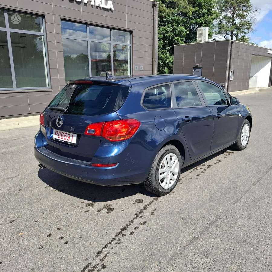 Blue Opel Astra 2012 in Utena, with an engine capacity of 1.40 L and mileage of 177 thousand km for 2900 €, photo 5 on AUTOMOTO.COM.LV