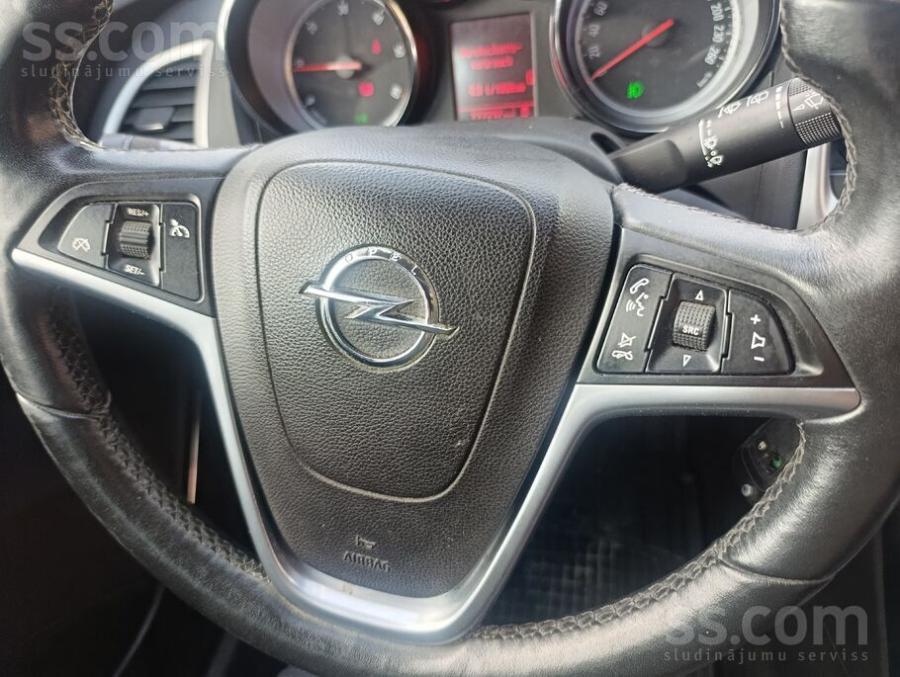 Blue Opel Astra 2012 in Rezekne, with an engine capacity of 1.70 L and mileage of 217 thousand km for 3950 €, photo 15 on AUTOMOTO.COM.LV