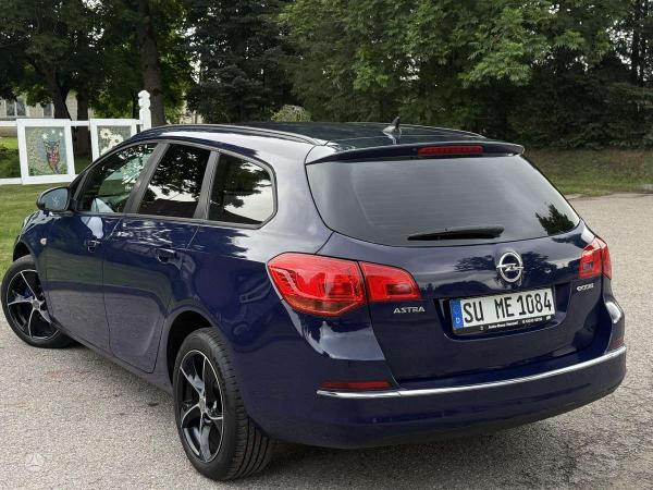 Blue Opel Astra 2012 in Raseiniai, with an engine capacity of 1.40 L and mileage of 276 thousand km for 2880 €, photo 5 on AUTOMOTO.COM.LV
