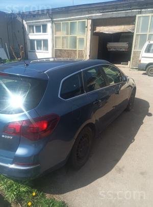 Zils Opel Astra 2013 Ogre, ar dzinēja tilpumu 1.70 L un nobraukumu 276 tūkst. km par 2000 €, foto  vietnē AUTOMOTO.COM.LV