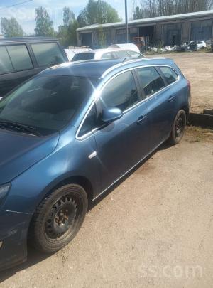 Zils Opel Astra 2013 Ogre, ar dzinēja tilpumu 1.70 L un nobraukumu 276 tūkst. km par 2000 €, foto 5 vietnē AUTOMOTO.COM.LV
