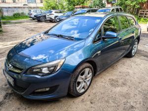 Zils Opel Astra 2013 Rīga, ar dzinēja tilpumu 2.00 L un nobraukumu 322 tūkst. km par 4000 €, foto  vietnē AUTOMOTO.COM.LV