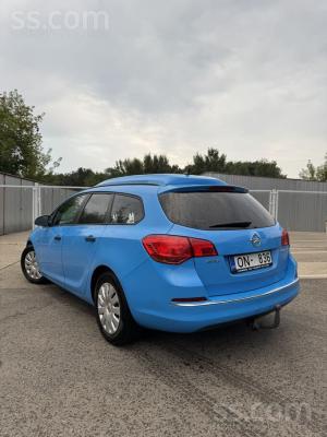 Zils Opel Astra 2013 Daugavpils, ar dzinēja tilpumu 1.30 L un nobraukumu 288 tūkst. km par 3199 €, foto 4 vietnē AUTOMOTO.COM.LV