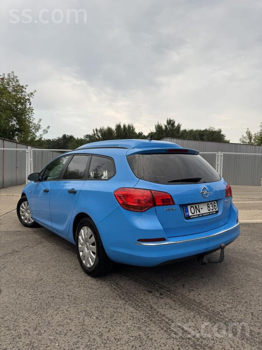 Zils Opel Astra 2013 Daugavpils, ar dzinēja tilpumu 1.30 L un nobraukumu 288 tūkst. km par 3199 €, foto 4 vietnē AUTOMOTO.COM.LV
