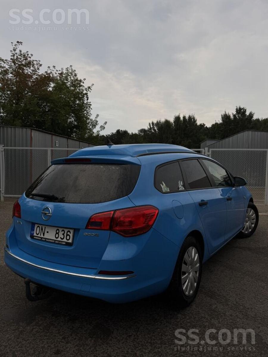 Zils Opel Astra 2013 Daugavpils, ar dzinēja tilpumu 1.30 L un nobraukumu 288 tūkst. km par 3199 €, foto 5 vietnē AUTOMOTO.COM.LV