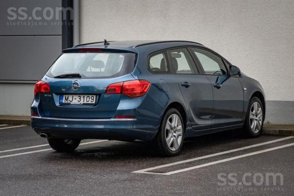 Zils Opel Astra 2013 Rīga, ar dzinēja tilpumu 2.00 L un nobraukumu 322 tūkst. km par 1650 €, foto 5 vietnē AUTOMOTO.COM.LV