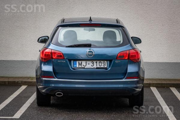 Zils Opel Astra 2013 Rīga, ar dzinēja tilpumu 2.00 L un nobraukumu 322 tūkst. km par 1650 €, foto 6 vietnē AUTOMOTO.COM.LV